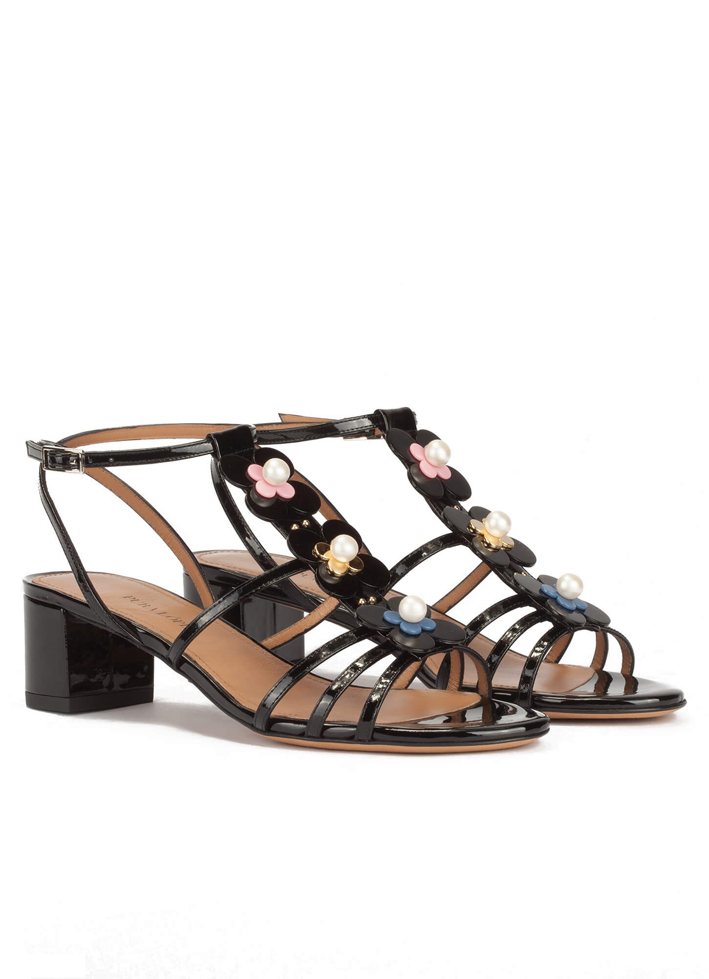 Floral-embellished mid block heel sandals in black patent . PURA LOPEZ